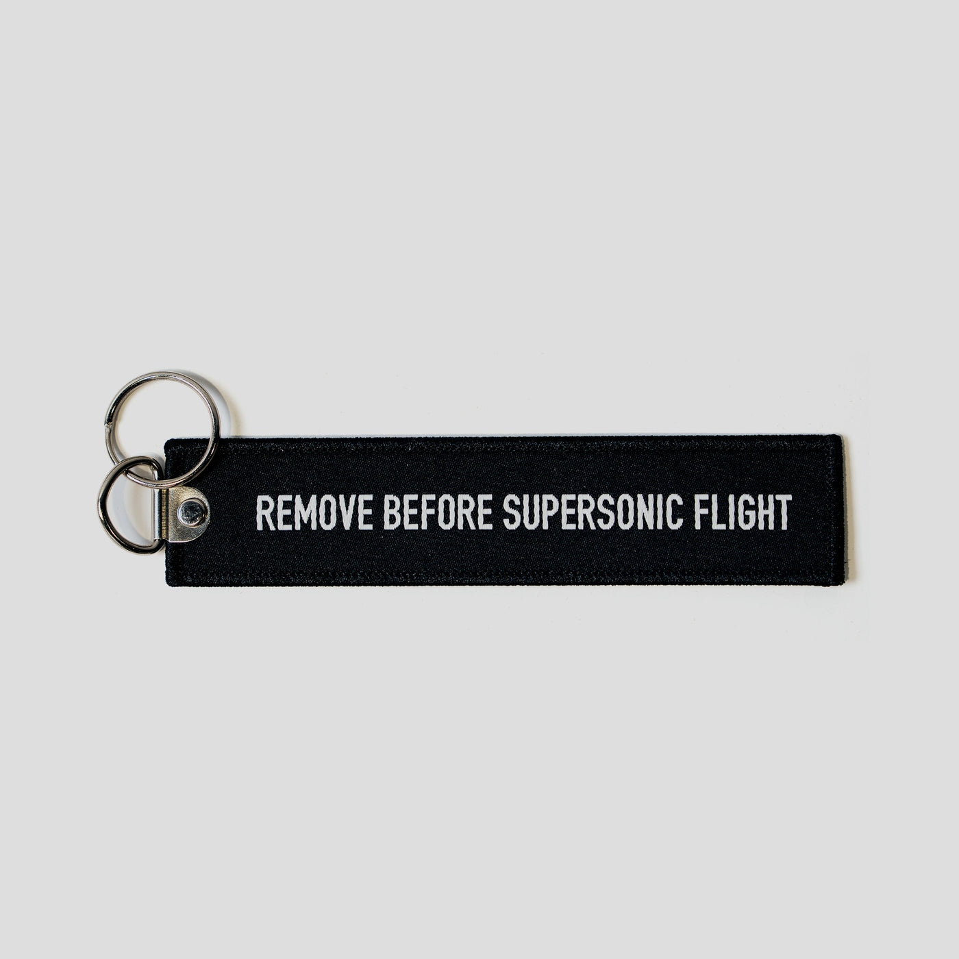 Remove Before Supersonic Flight Keychain